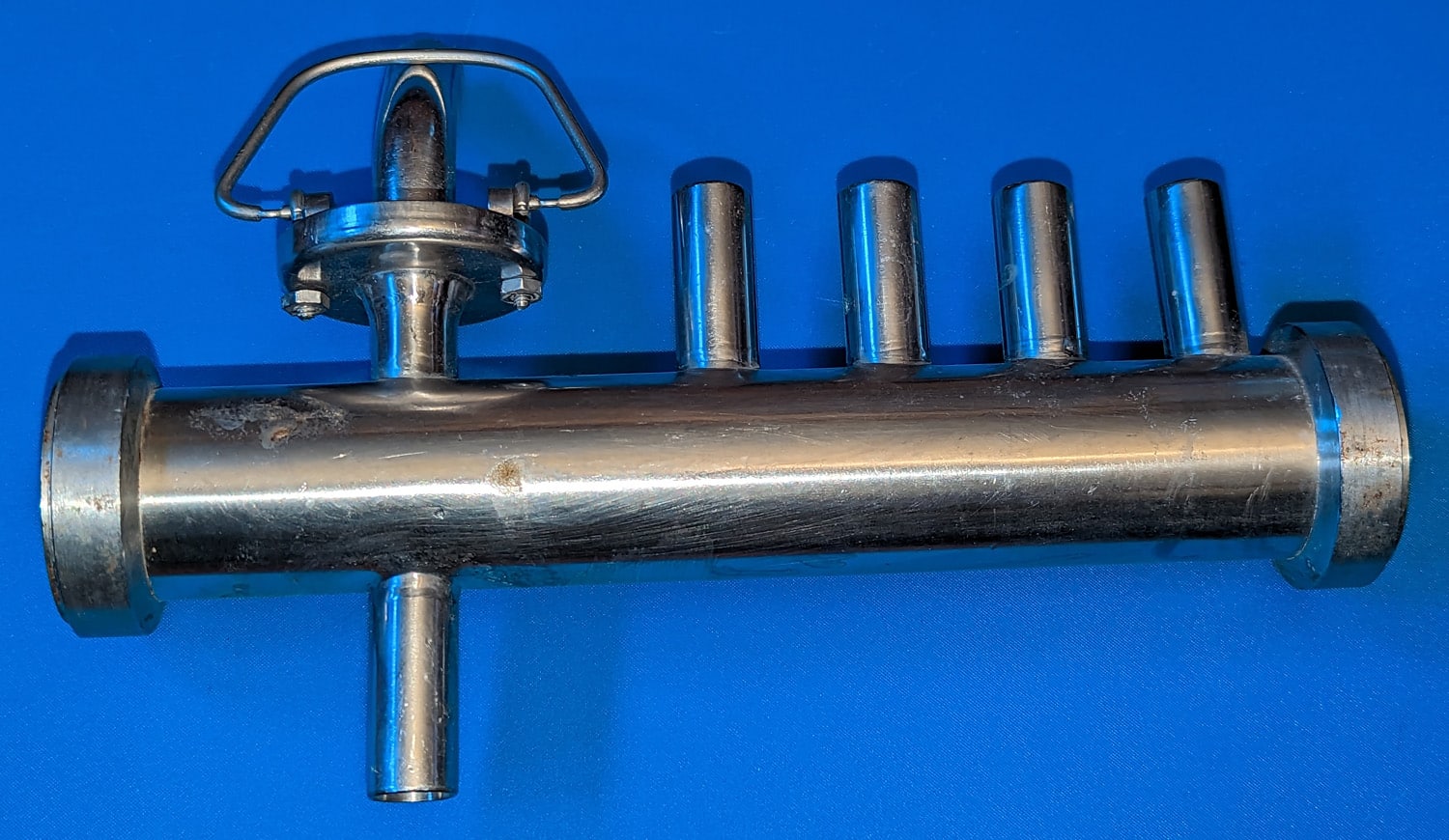 Manifold, 9 1/2″L, 4 Inlets & Water Inlet, 1 1/2″ Surge x 1 1/2″ Surge